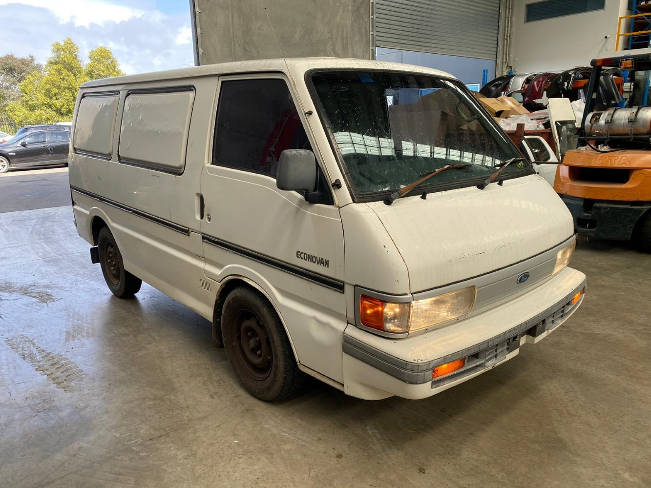 Car Wreckers - Ford Econovan 1997 White Auto Petrol