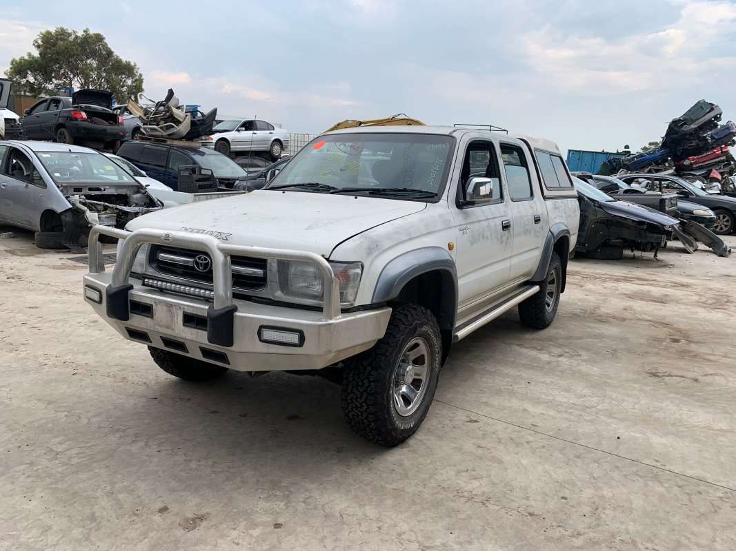 Car Wreckers - Toyota Hilux 1998 White Manual Petrol