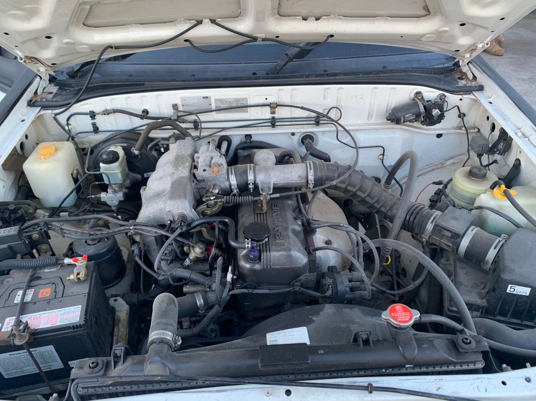 Car Wreckers - Ford Courier 2001 White Manual Petrol