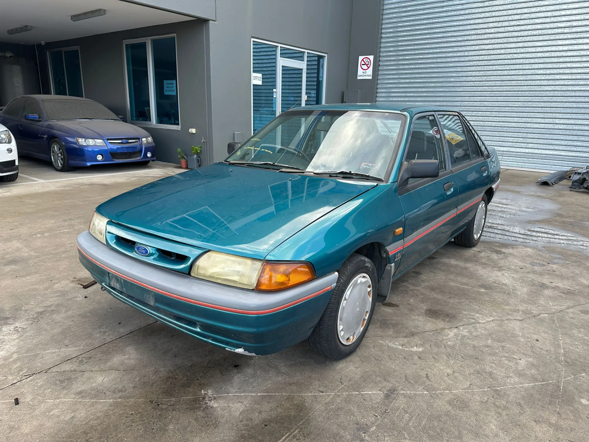 Car Wreckers - Ford Laser 1994 Green Auto Petrol